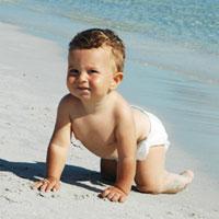 Cu bebelusul la plaja - REVISTA BABY: Pentru părinti și copii